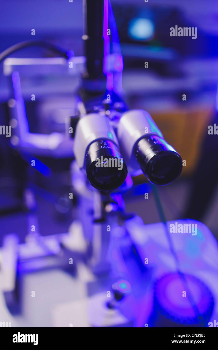 A modern microscope for vision testing in a light room. Microscope for ...