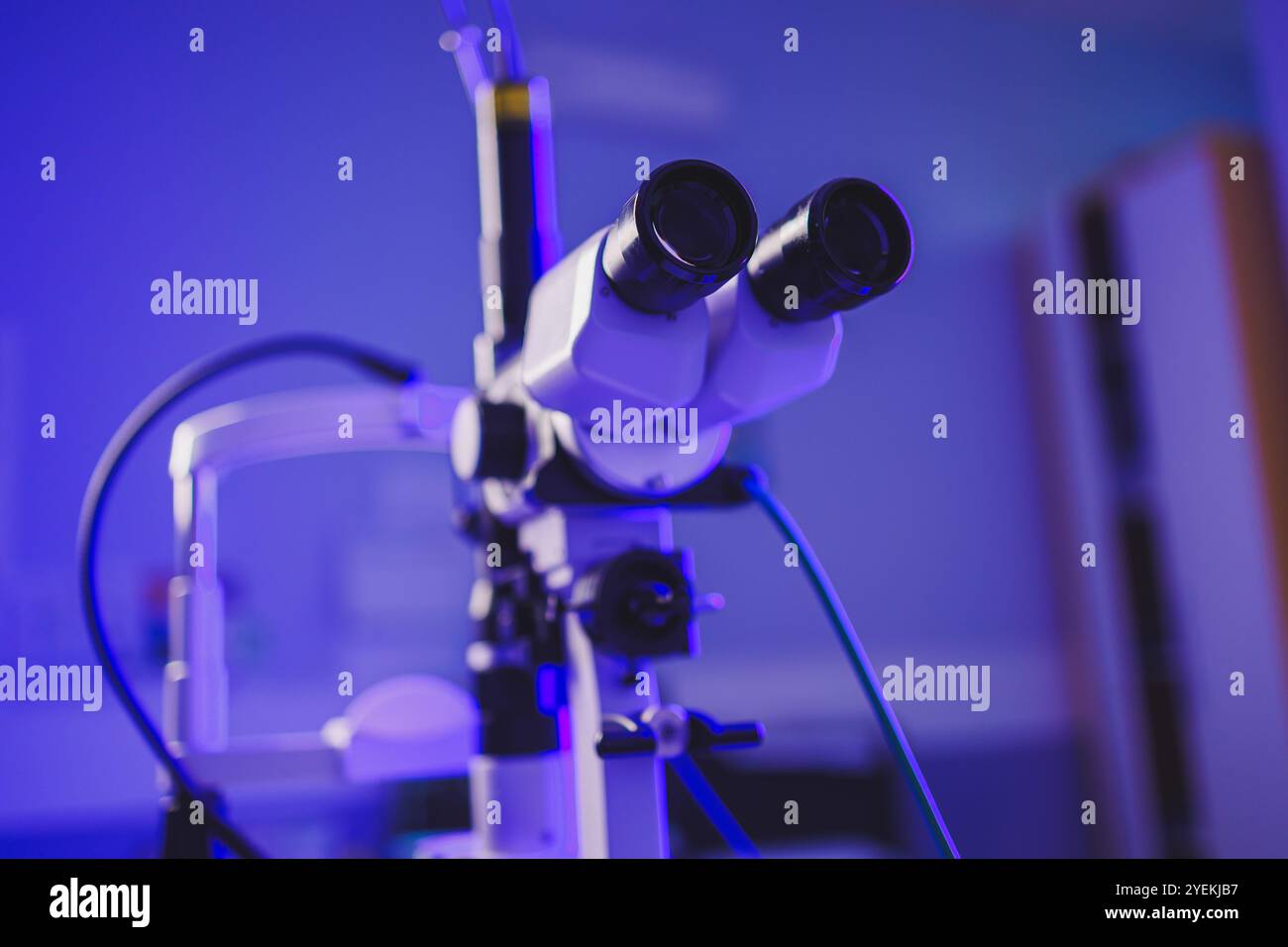 A modern microscope for vision testing in a light room. Microscope for ...