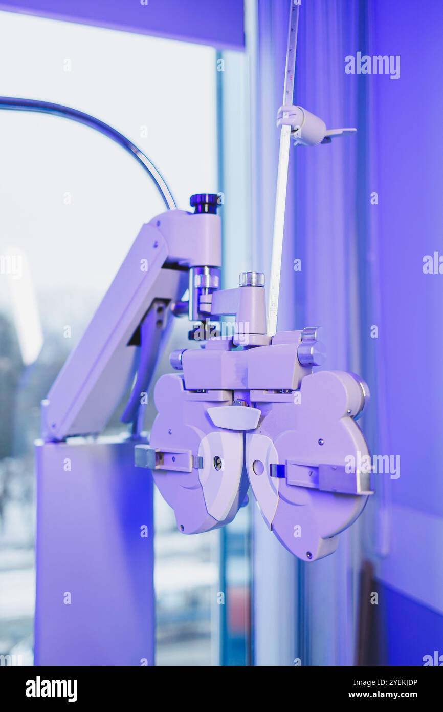 A modern microscope for vision testing in a light room. Microscope for ...