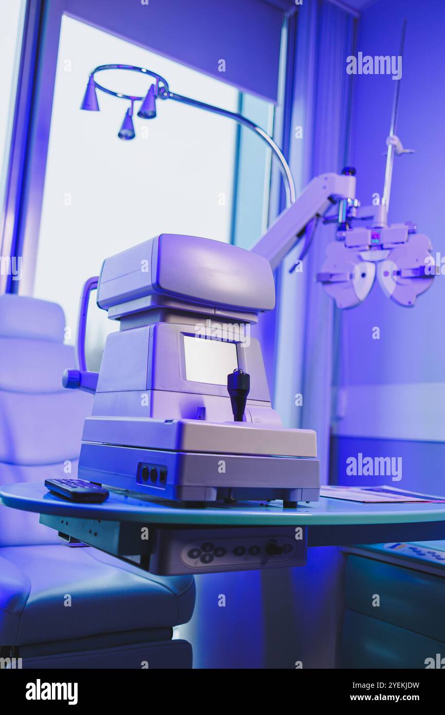 A modern microscope for vision testing in a light room. Microscope for ...