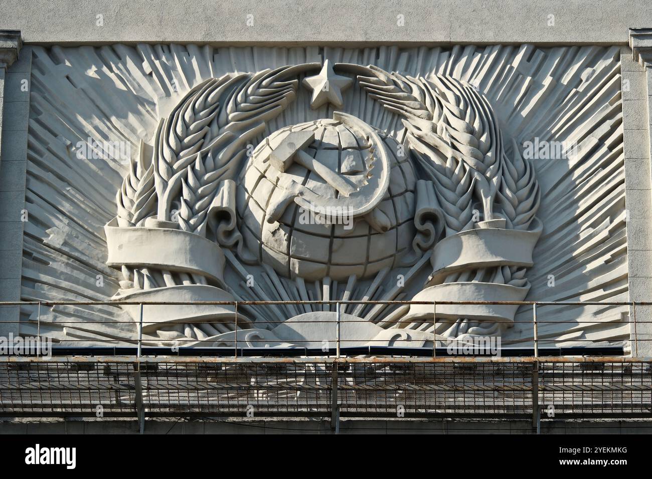 The emblem of the USSR on the facade of the State Duma building. Coat ...