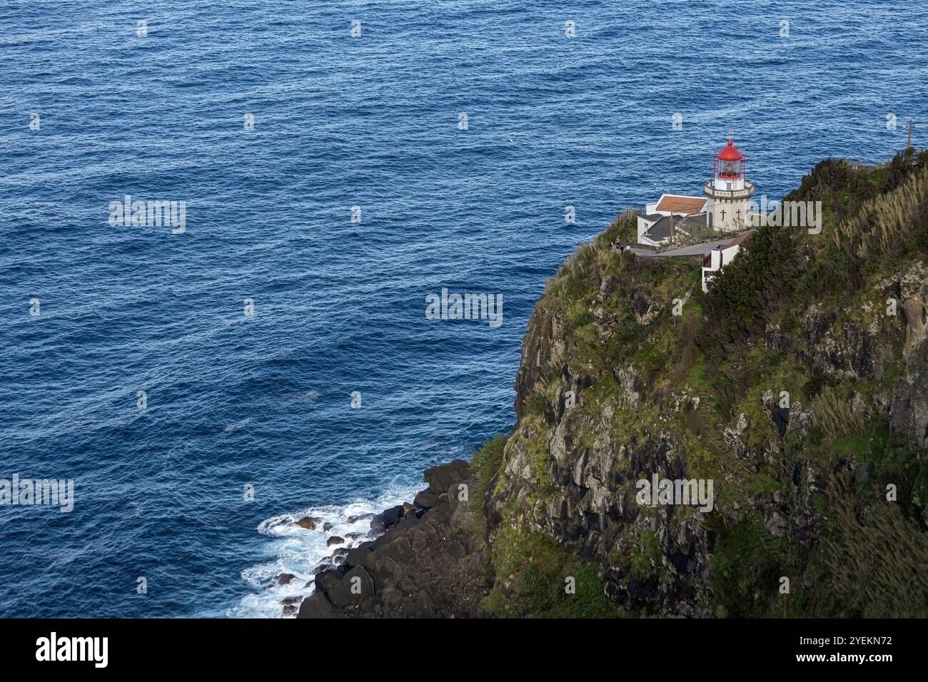 Lighthouse on the cliff at Terseira island Azores Portugal Stock Photo ...