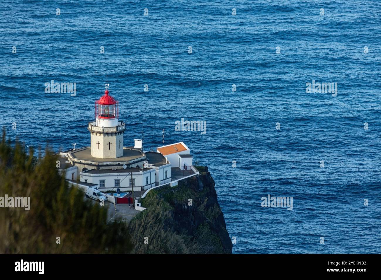 Lighthouse on the cliff at Terseira island Azores Portugal Stock Photo ...