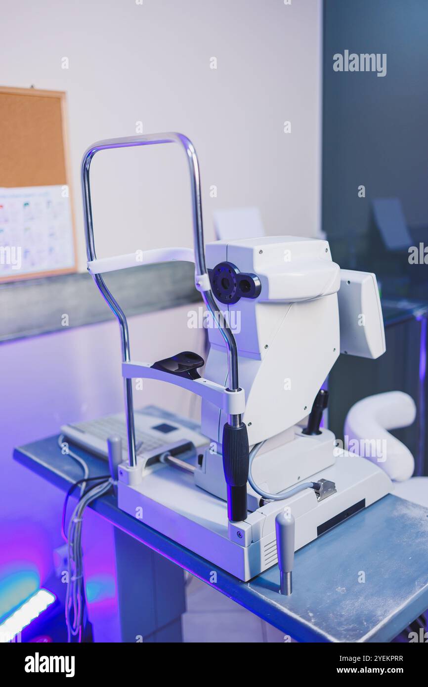A modern microscope for vision testing in a light room. Microscope for ...