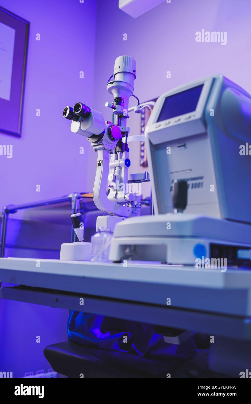 A modern microscope for vision testing in a light room. Microscope for ...