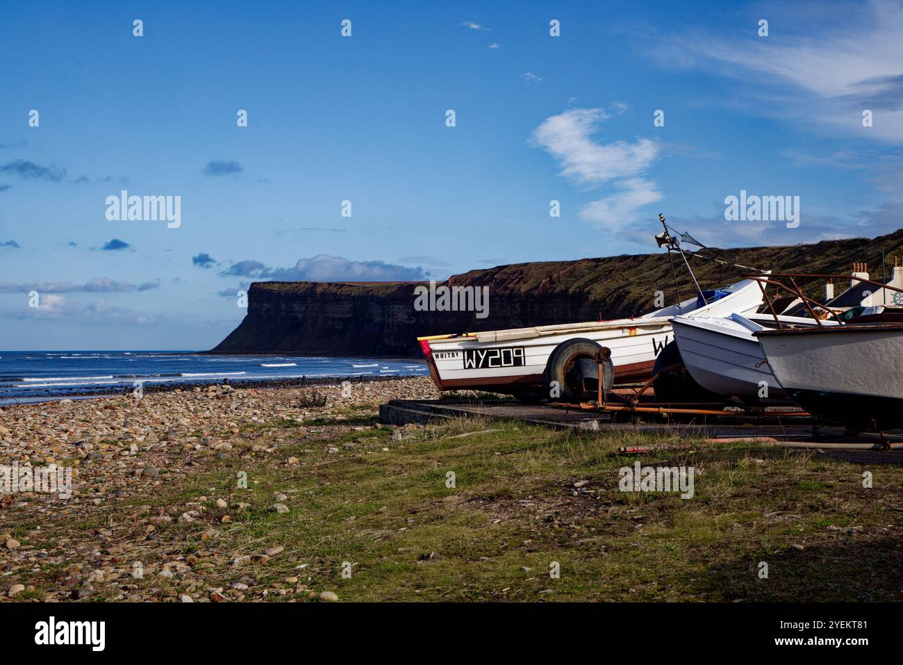 Fishing boats drawn up on the beach at Saltburn Sands, Teesside ...