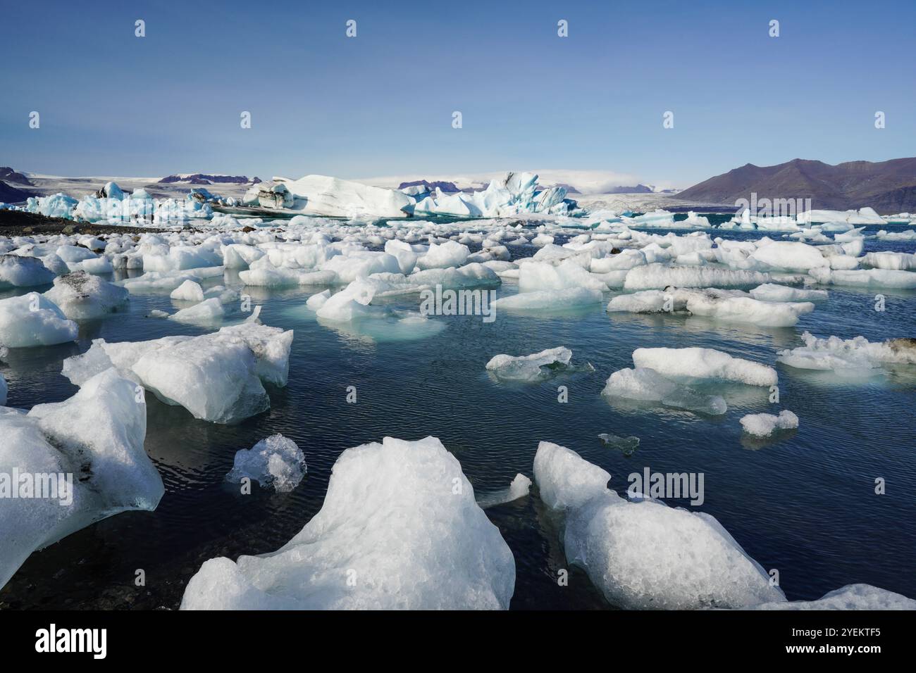 The Jökulsárlón glacier lagoon with many icebergs that flow out to the ...