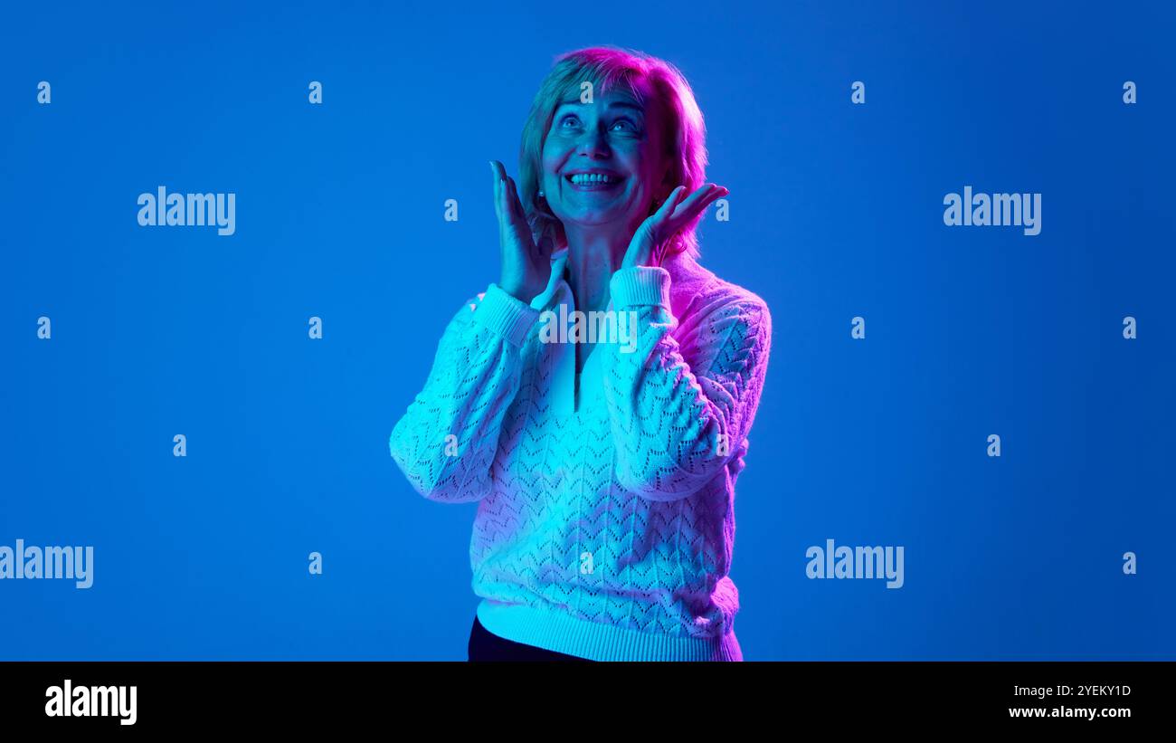 Portrait of happy, emotional mature woman, expressing joy and ...