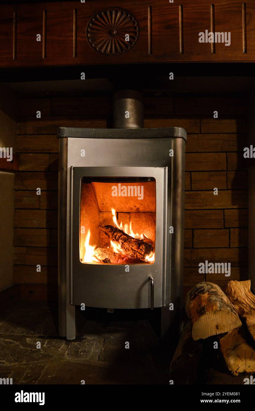 House with wood stove heating hi-res stock photography and images - Alamy