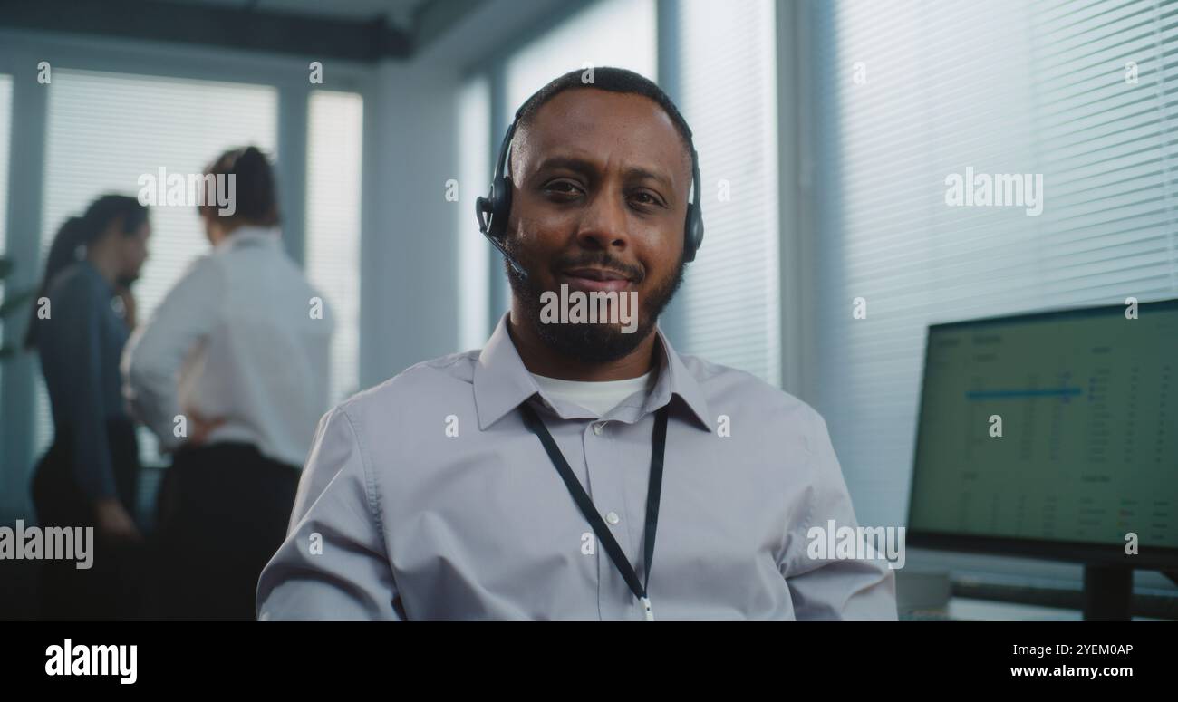 Call center office: Close up portrait of friendly African American ...