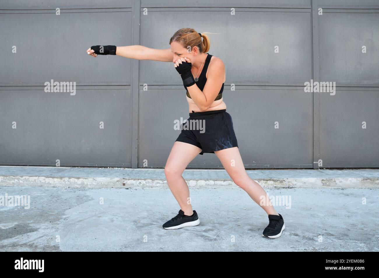 A fit blonde women boxer during boxing training Stock Photo - Alamy