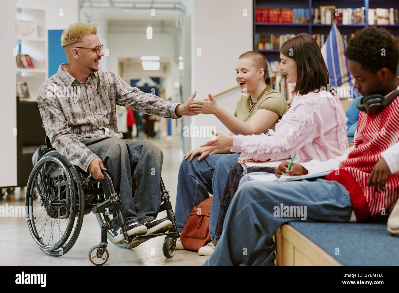 Group of friends sitting and engaging in lively conversation in modern ...