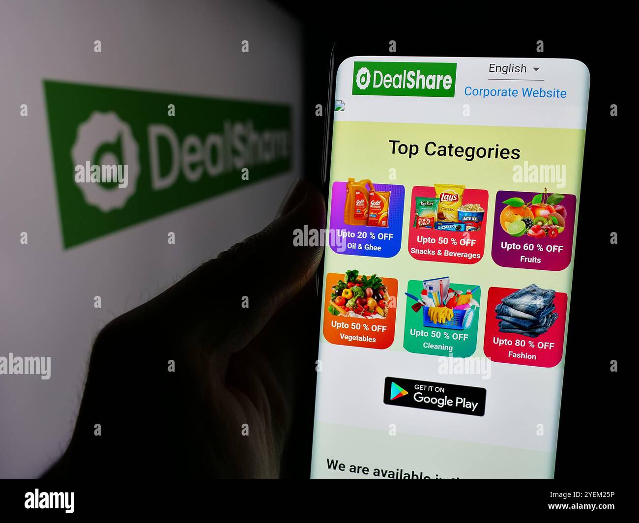 Person holding smartphone with webpage of Indian e-commerce company ...