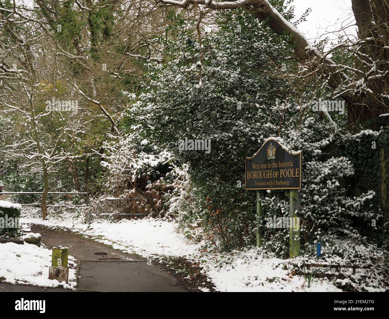 sign for the Borough of Poole in Dorset in the snow Stock Photo - Alamy