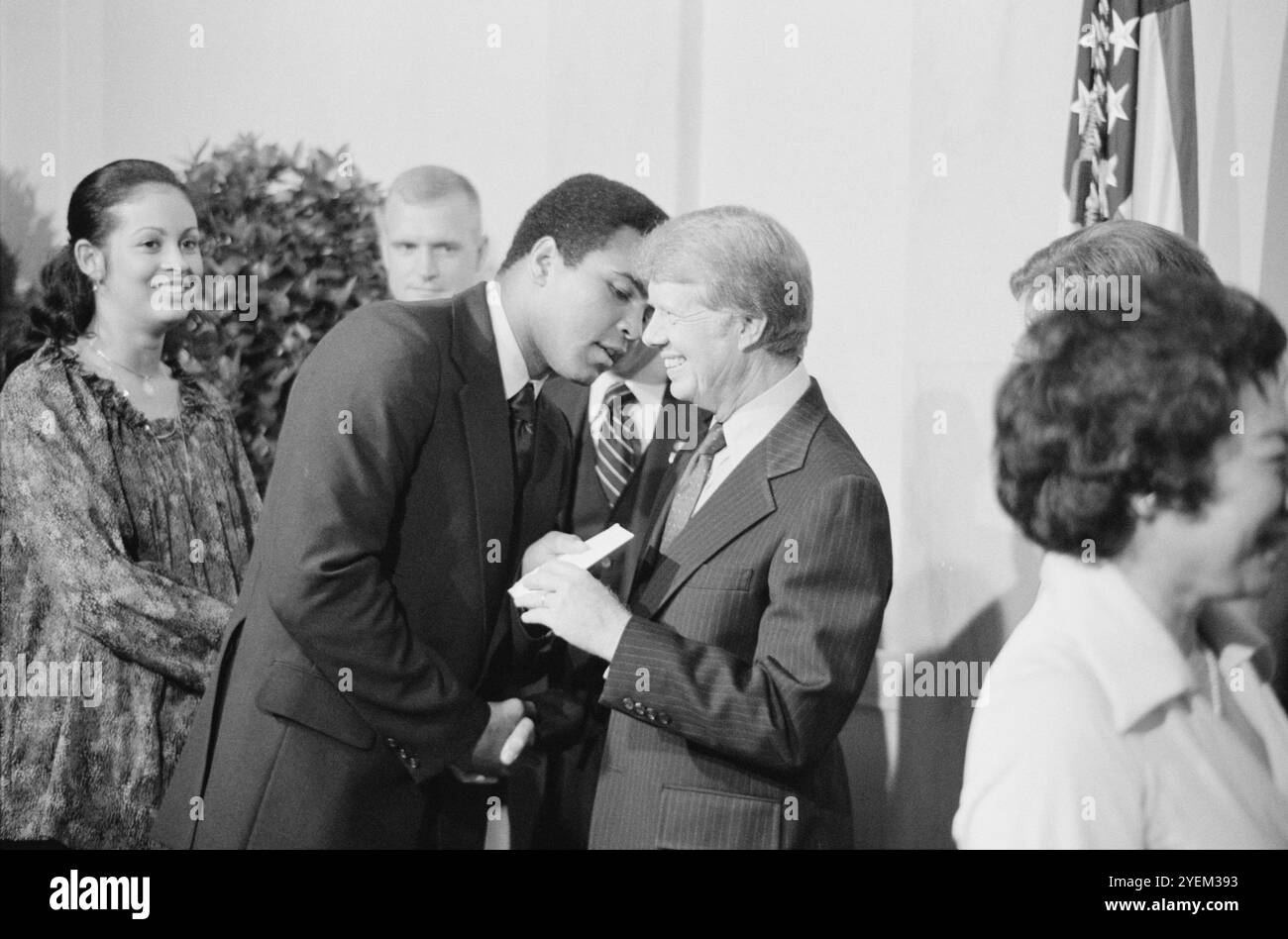 President Jimmy Carter greets Mohammed Ali at a White House dinner ...