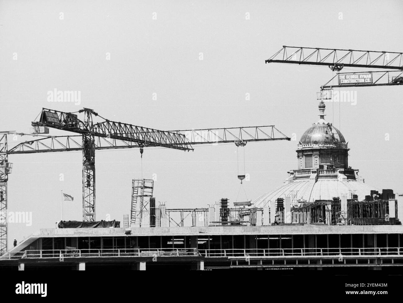 Vintage photo of construction cranes Black and White Stock Photos ...
