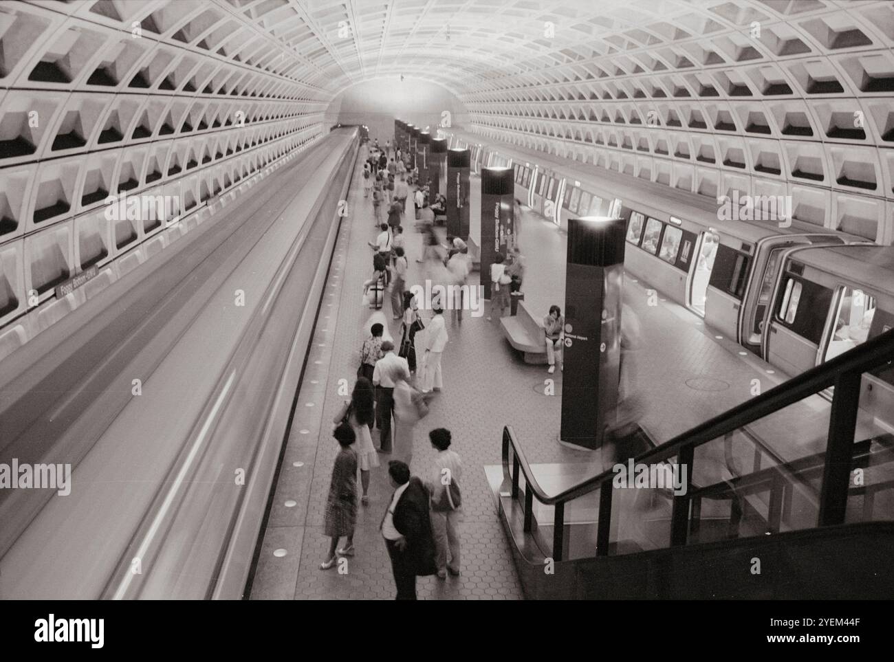 People on the platform and train at the Foggy Bottom metro station on ...