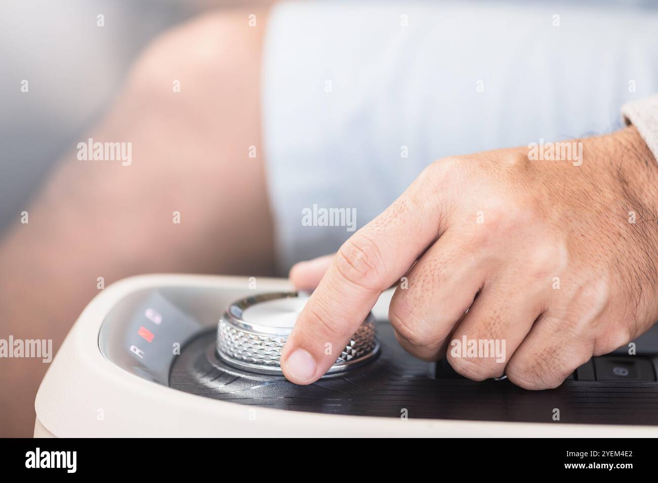 Hand rotating the gear selector in an electric vehicle, EV transmission ...