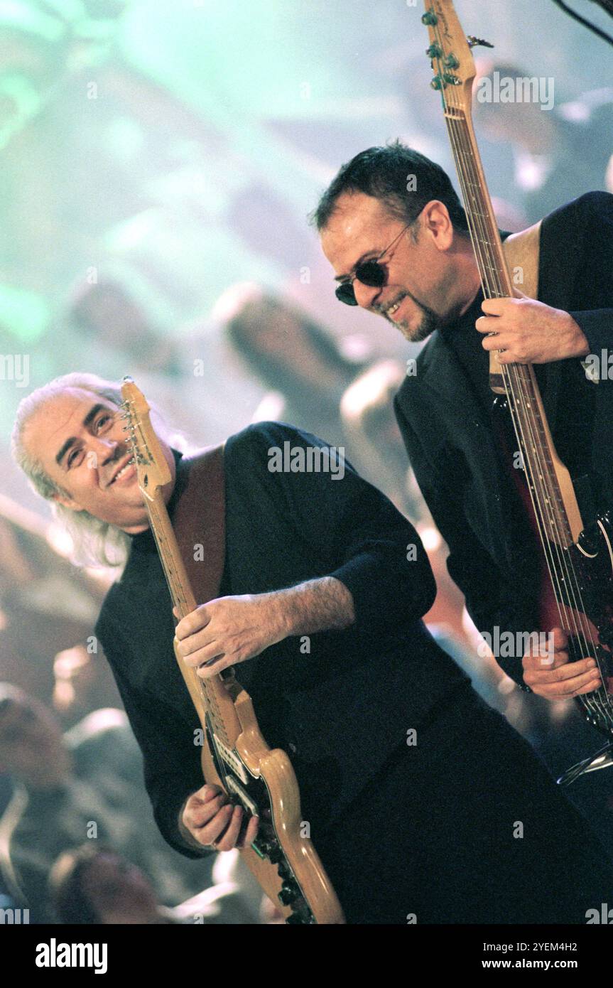 Milan Italy 19/04/1998: Franco Mussida guitarist and Patrick Djivas ...