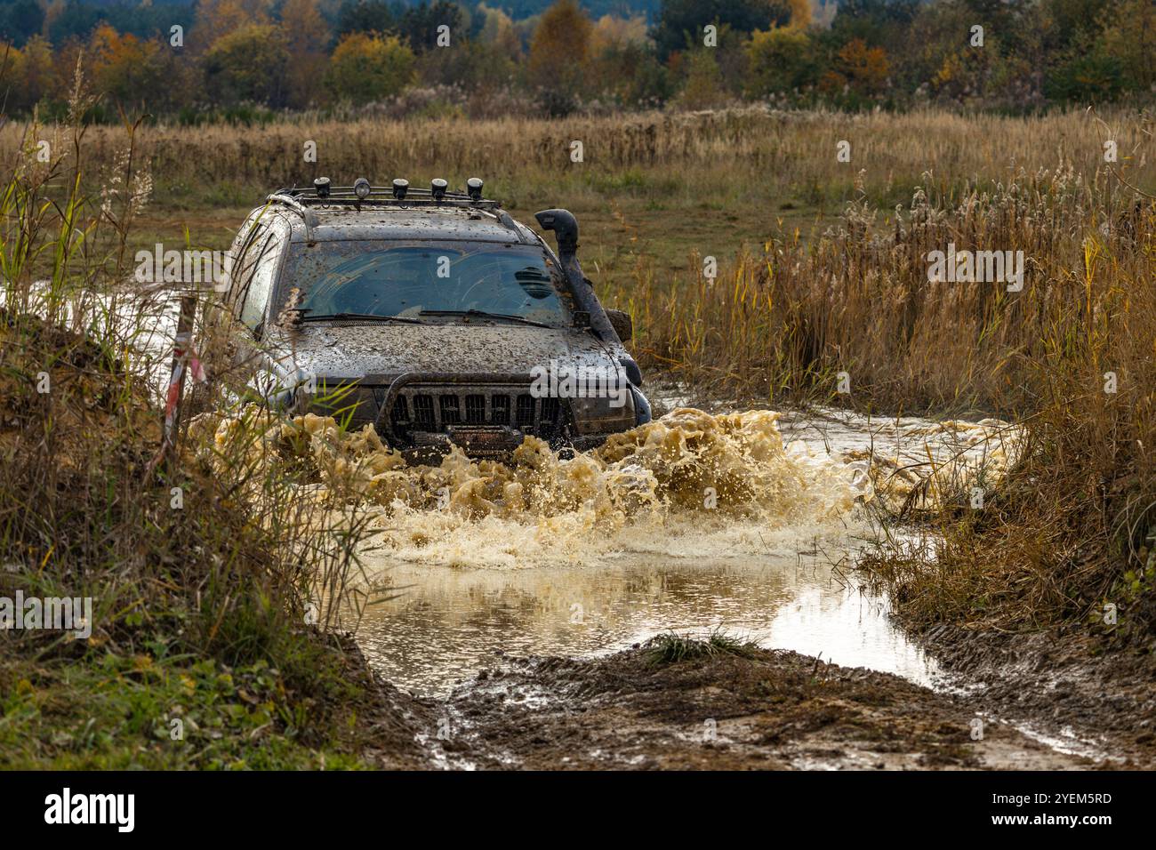 Off-road vehicles, driving in mud, overcoming off-road obstacles in a ...