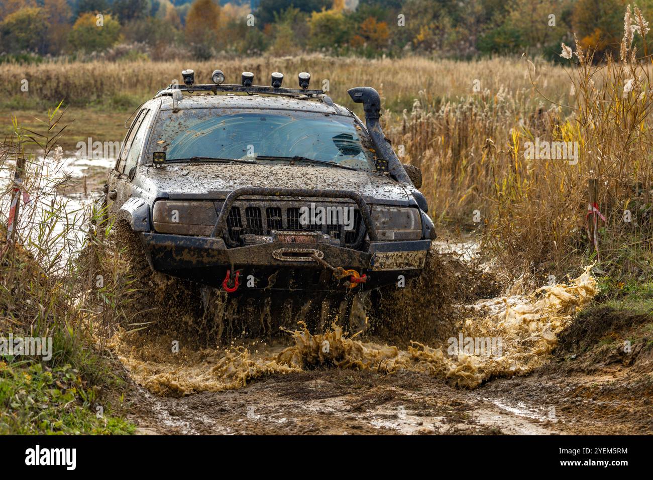Off-road vehicles, driving in mud, overcoming off-road obstacles in a ...