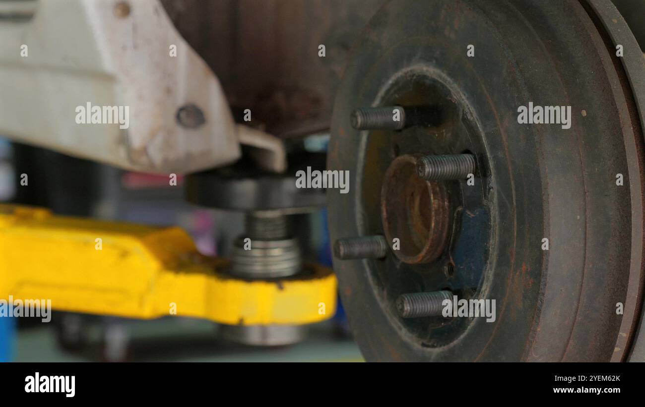 Close-up of car brake assembly being repaired in auto repair shop Stock ...