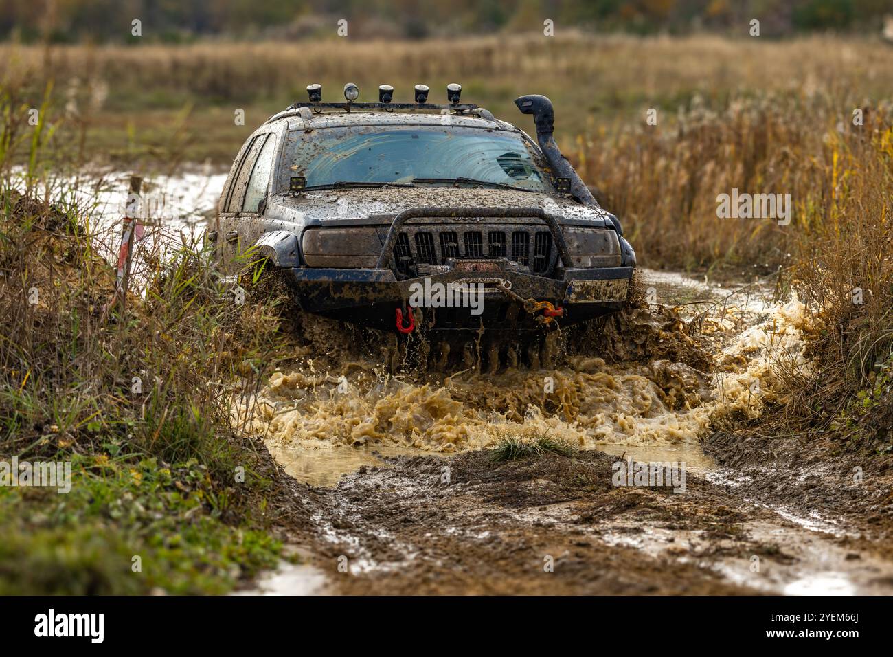 Off-road vehicles, driving in mud, overcoming off-road obstacles in a ...