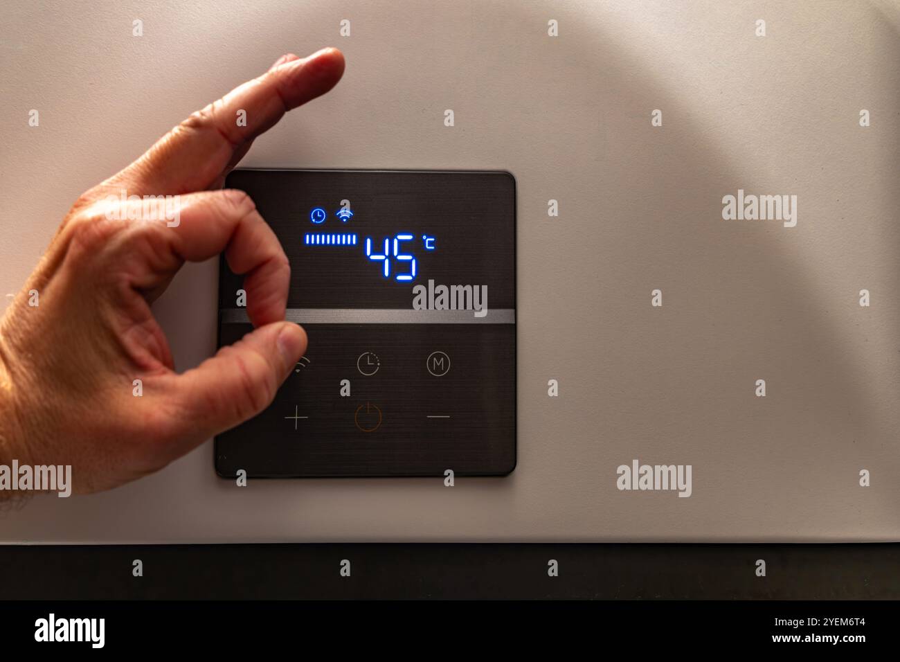 Electronic panel for setting the temperature in the water heater ...