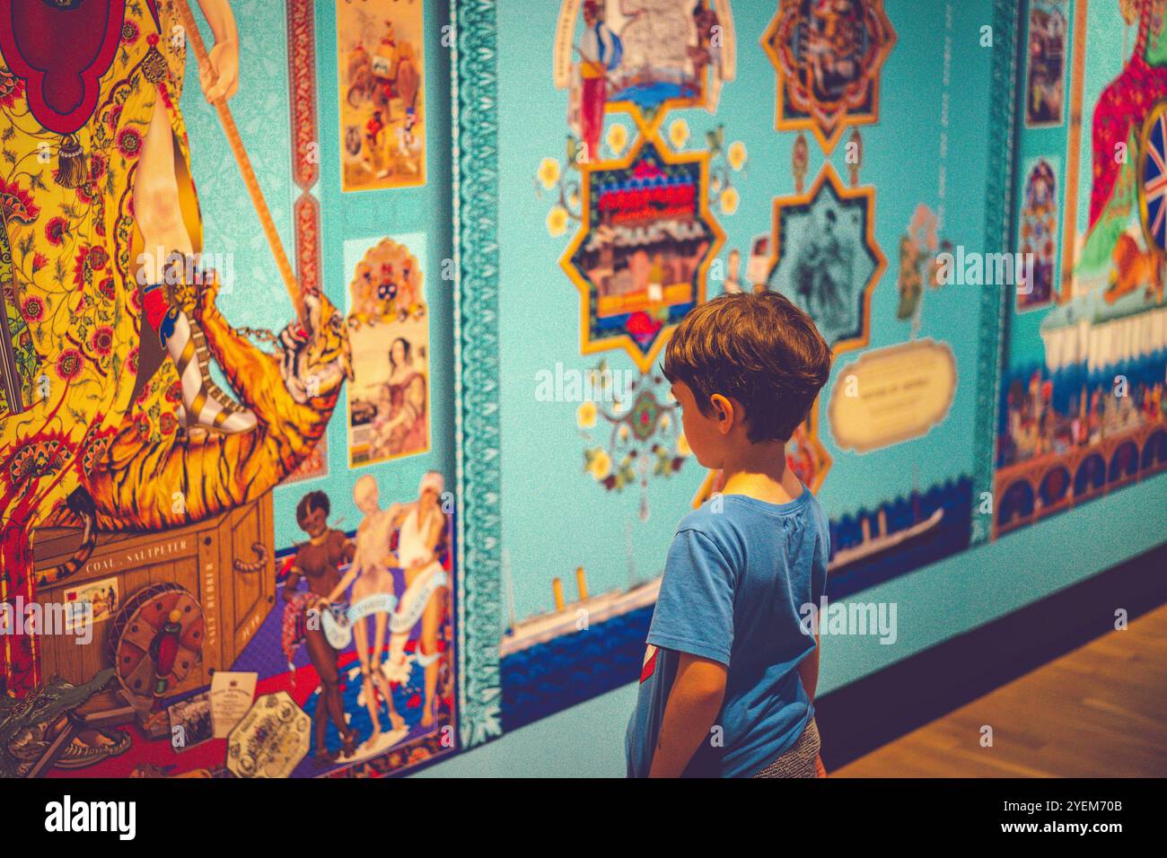 Child looking at exhibits in Manchester Museum 2024 Stock Photo - Alamy