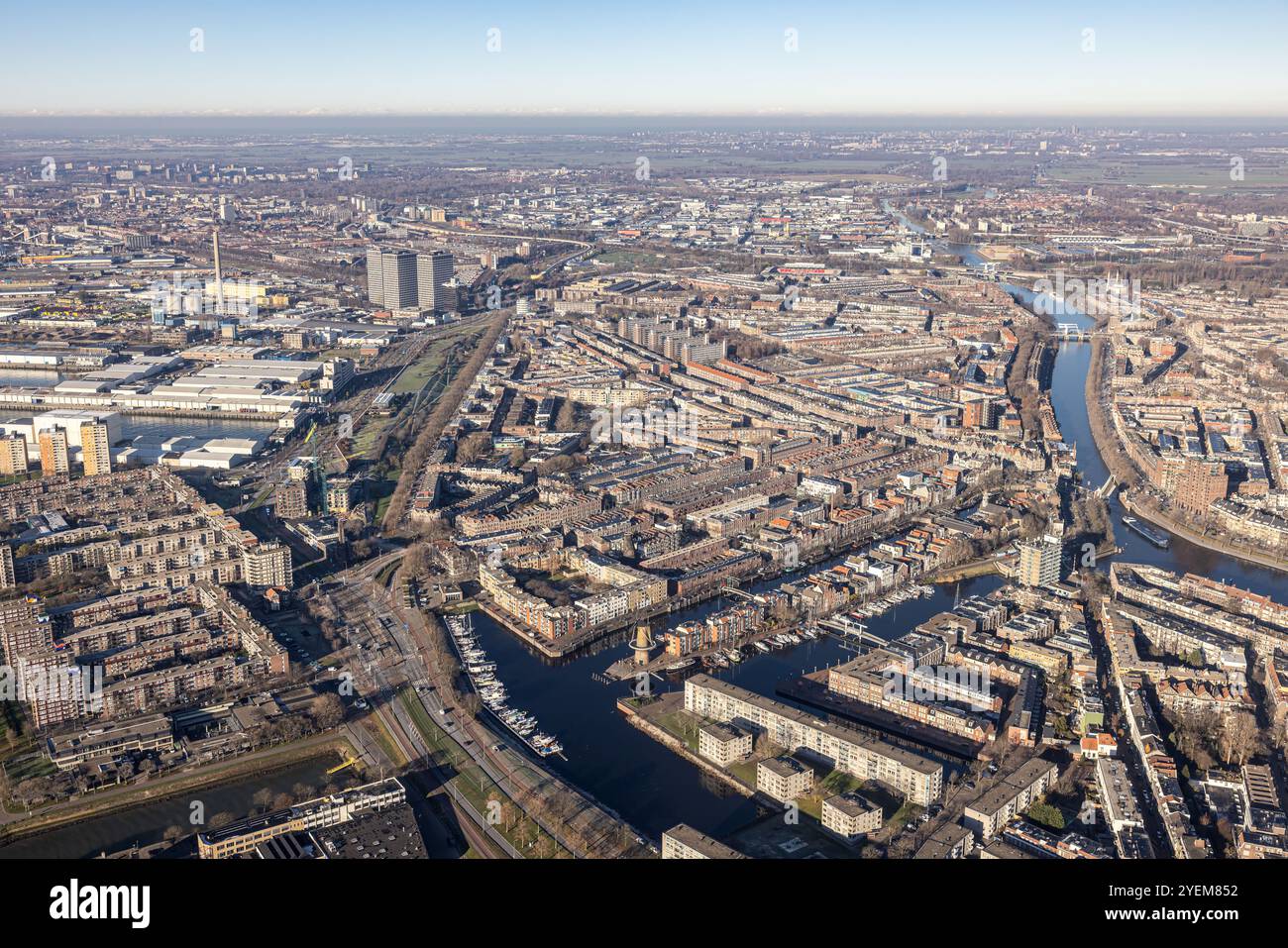 Aerial view Dutch city Rotterdam with residential area, river and ...