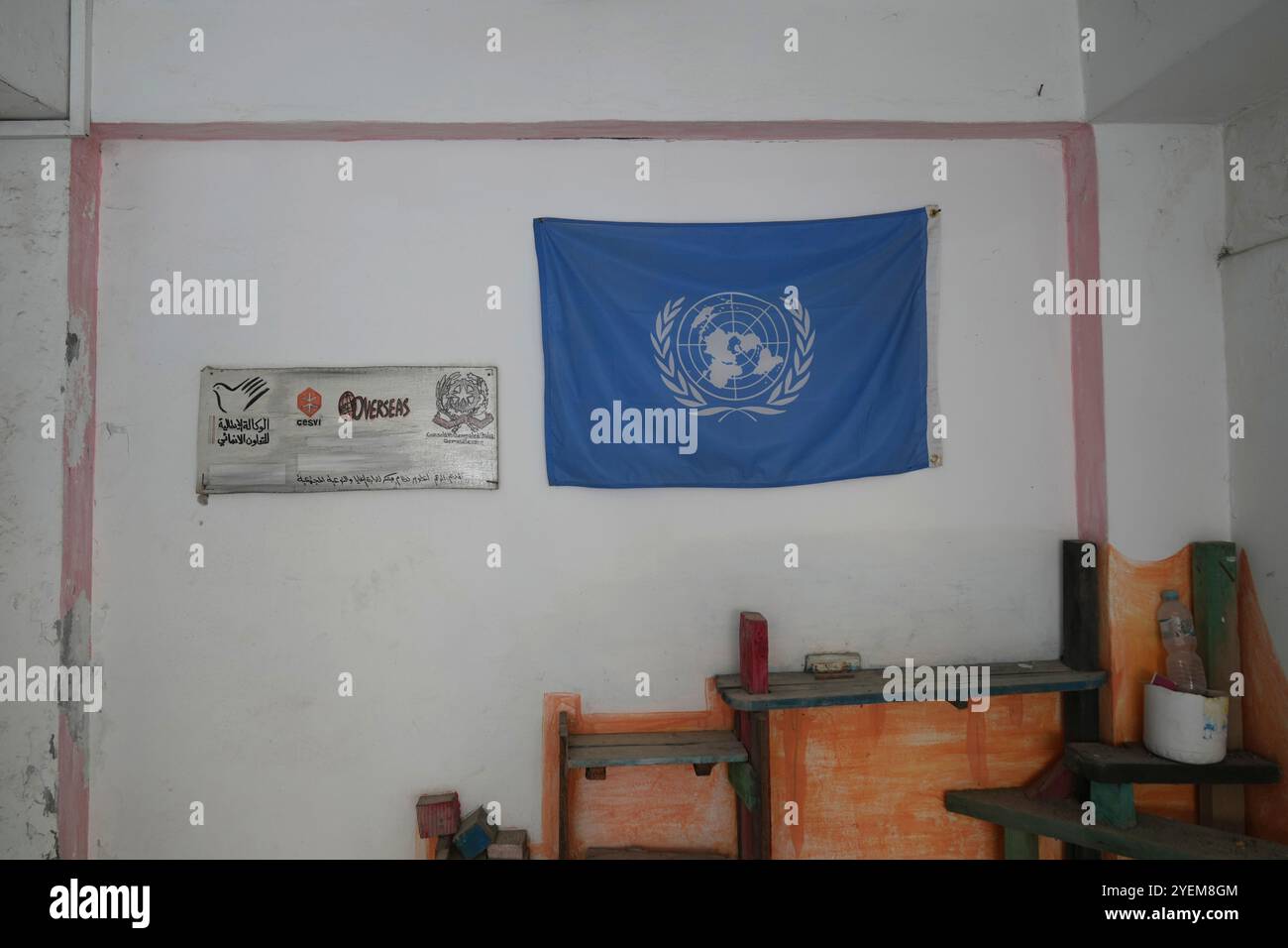 A U.N. flag is hanged on the wall at the office of the United Nations ...