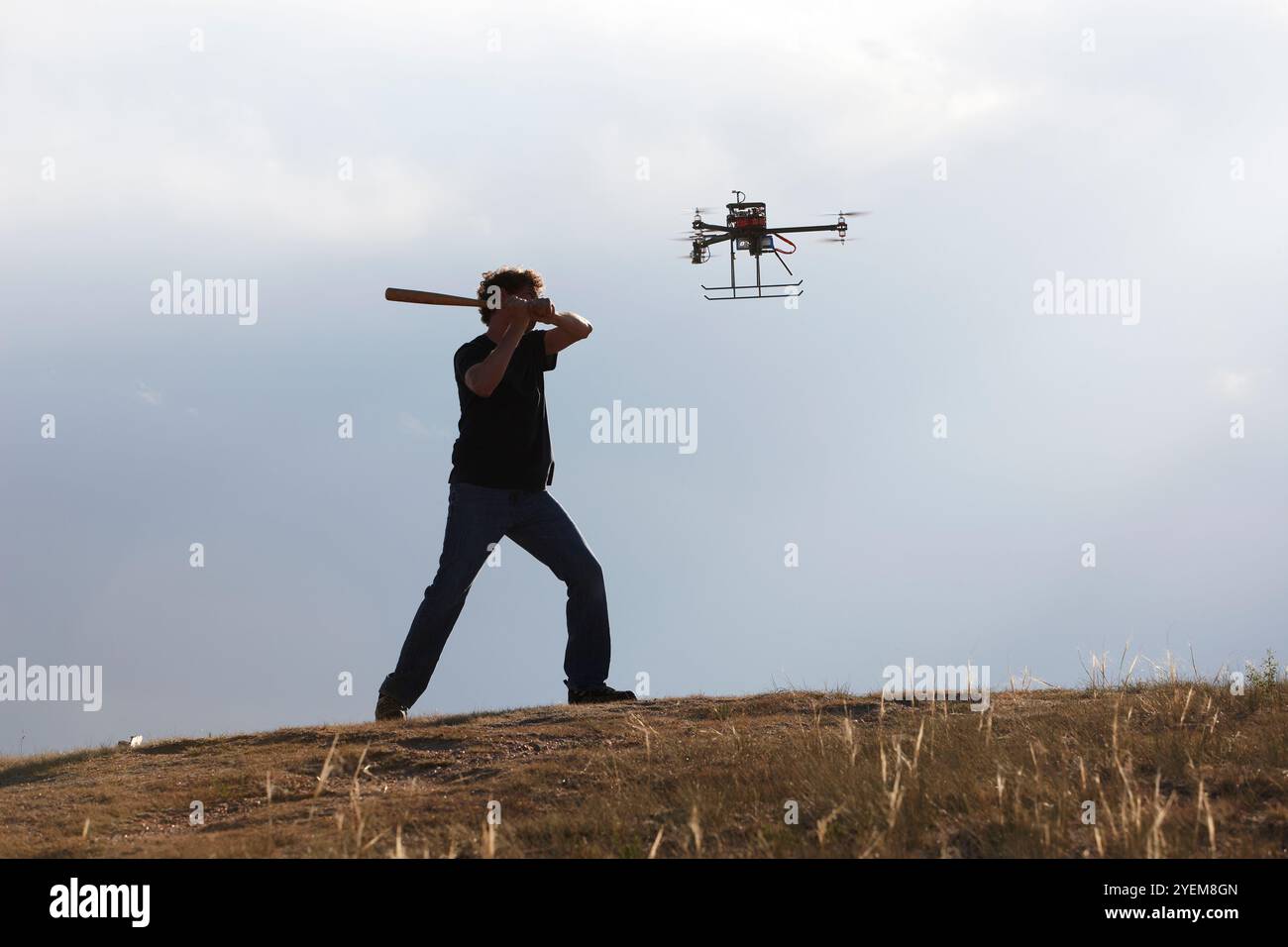 Man defends himself from an attacking drone (UAV) with a baseball bat ...