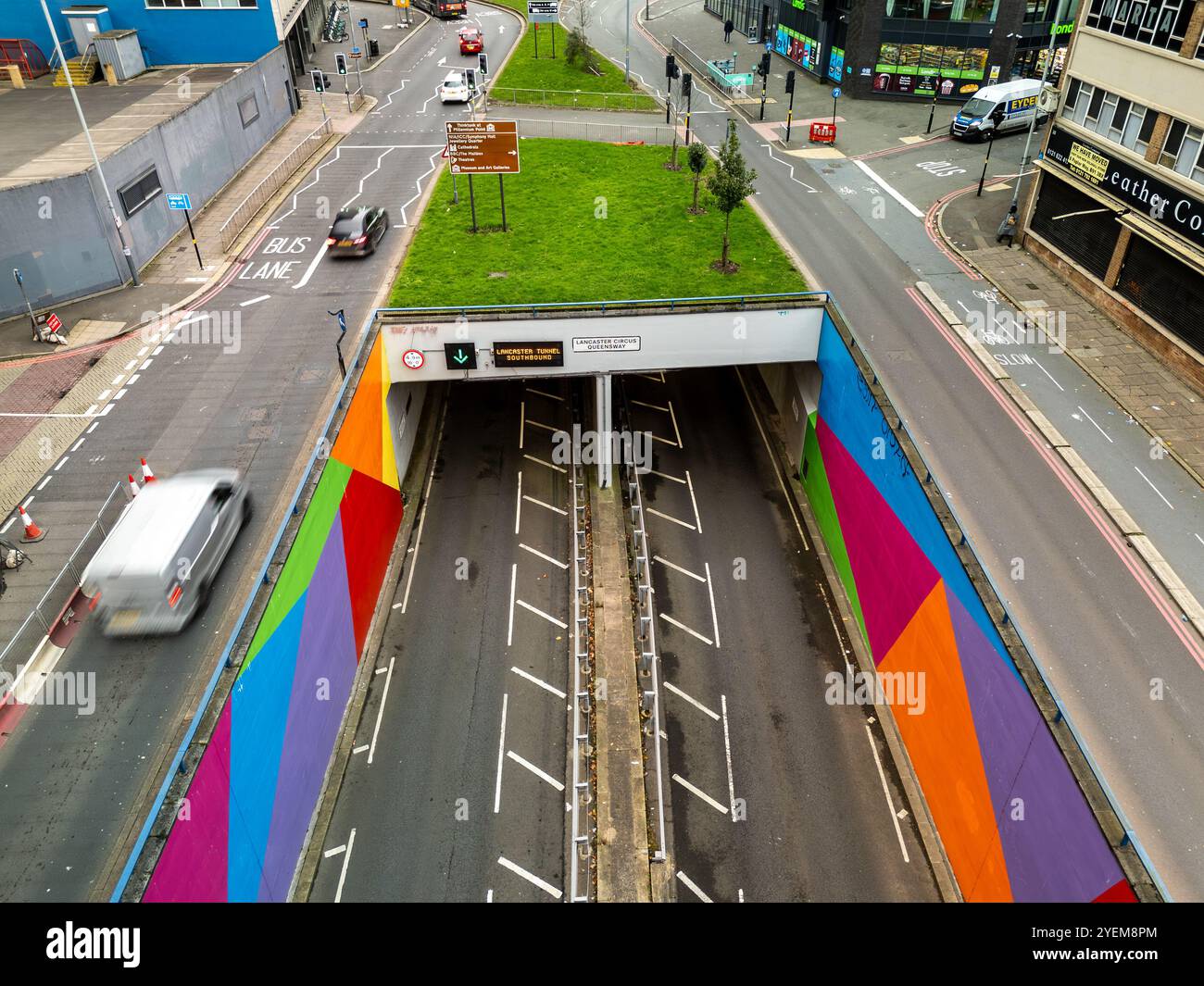 Aerial view of a vibrant underpass entrance, connecting roads and ...