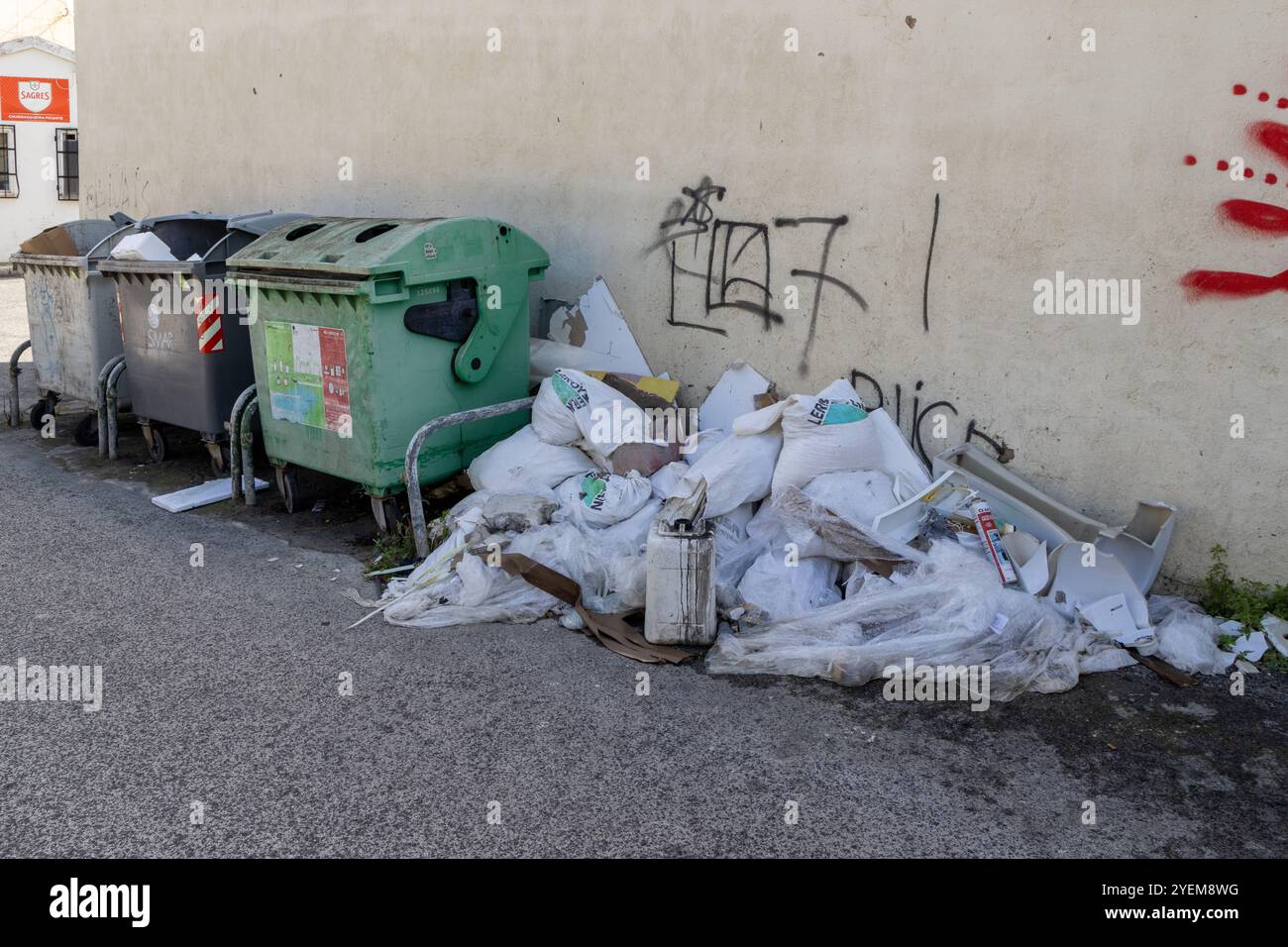Overflowing dumpsters and construction debris create an unsanitary and ...