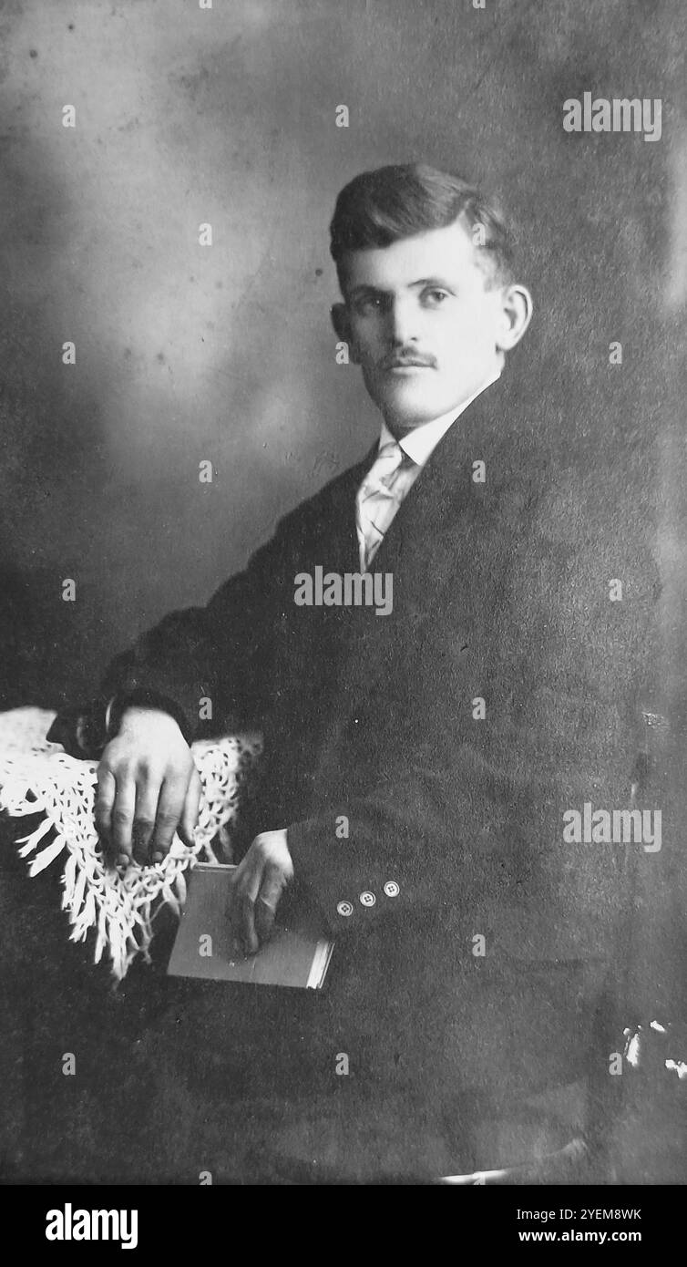 Young elegant man in suit Black and White Stock Photos & Images - Alamy