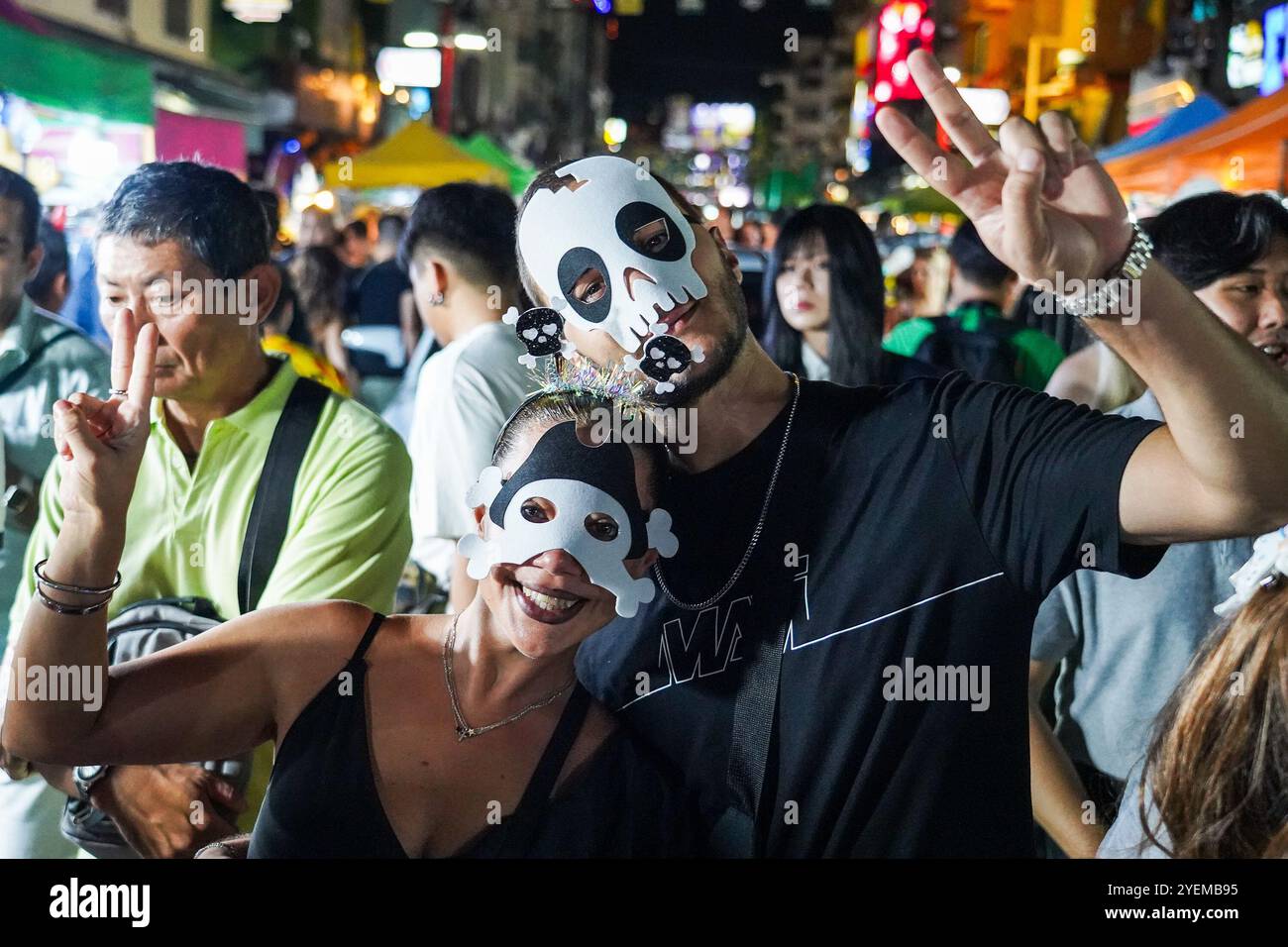 Bangkok, Thailand. 31st Oct, 2024. Tourists wearing ghost face-mask ...