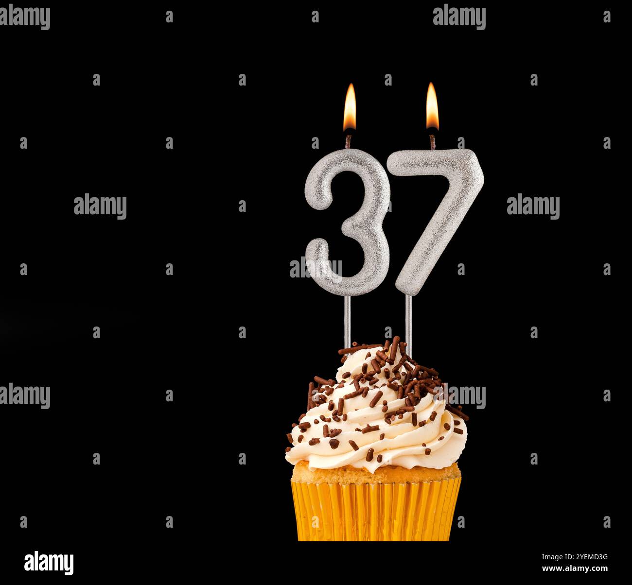 Birthday cupcake on black background - Number 37 shaped candles Stock ...