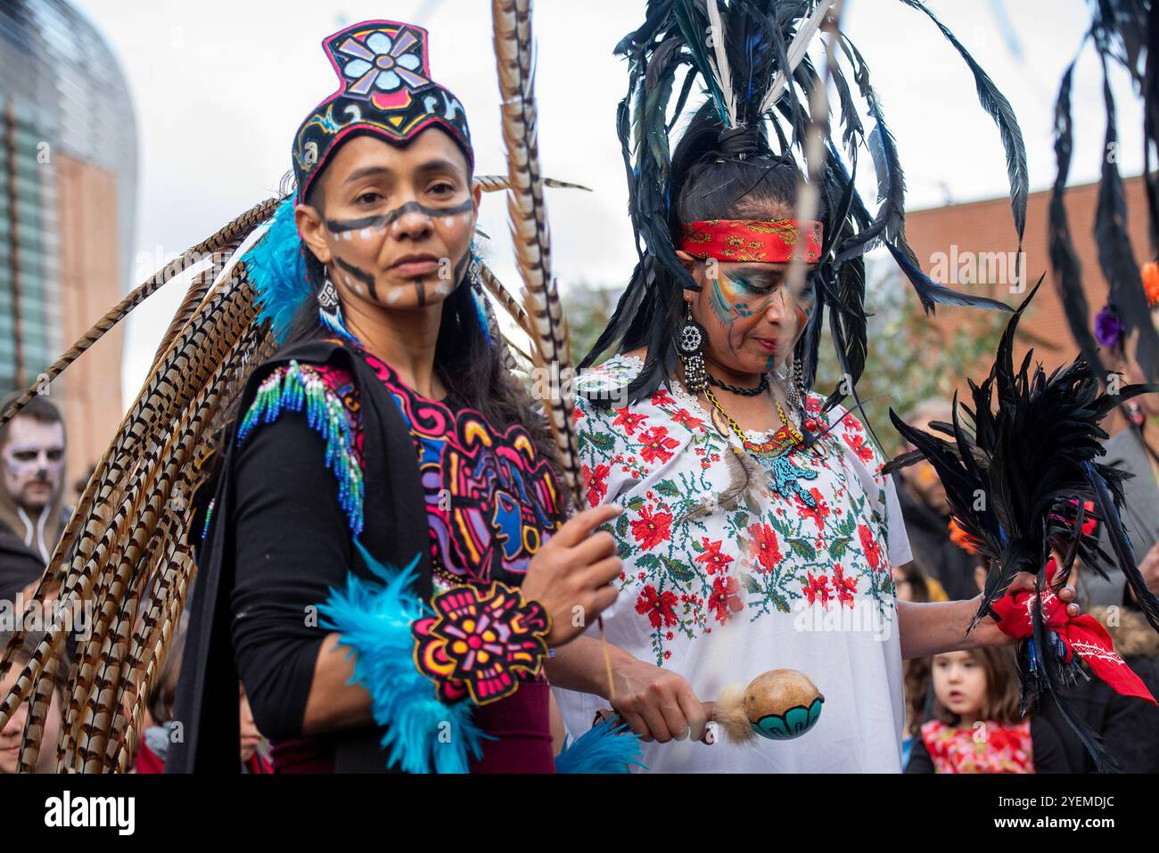 Aztec musicians with beautiful headdresses perform during the show ...