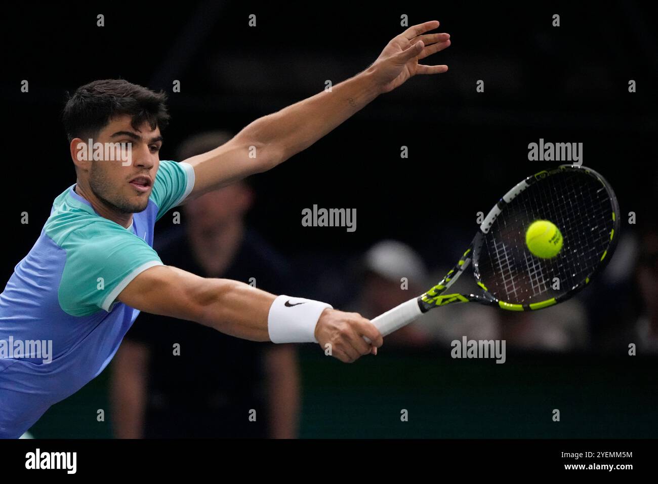 Spain's Carlos Alcaraz backhands to France's Ugo Humbert during their ...