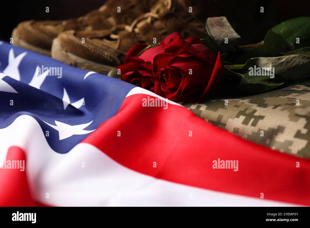 Veterans day. American flag, roses and military uniform, closeup Stock ...