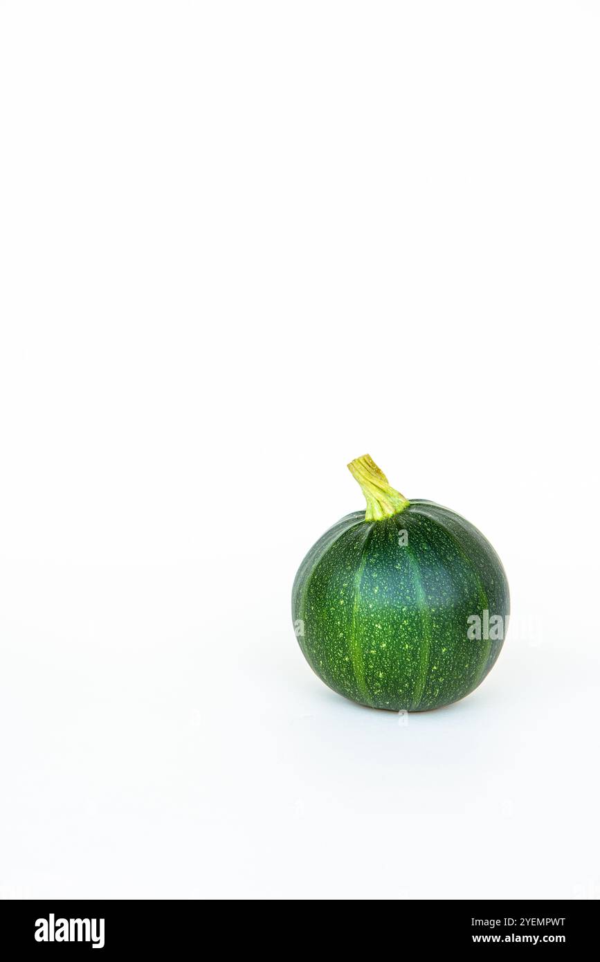 Green zucchini or round courgette - cucurbita pepo on white background ...