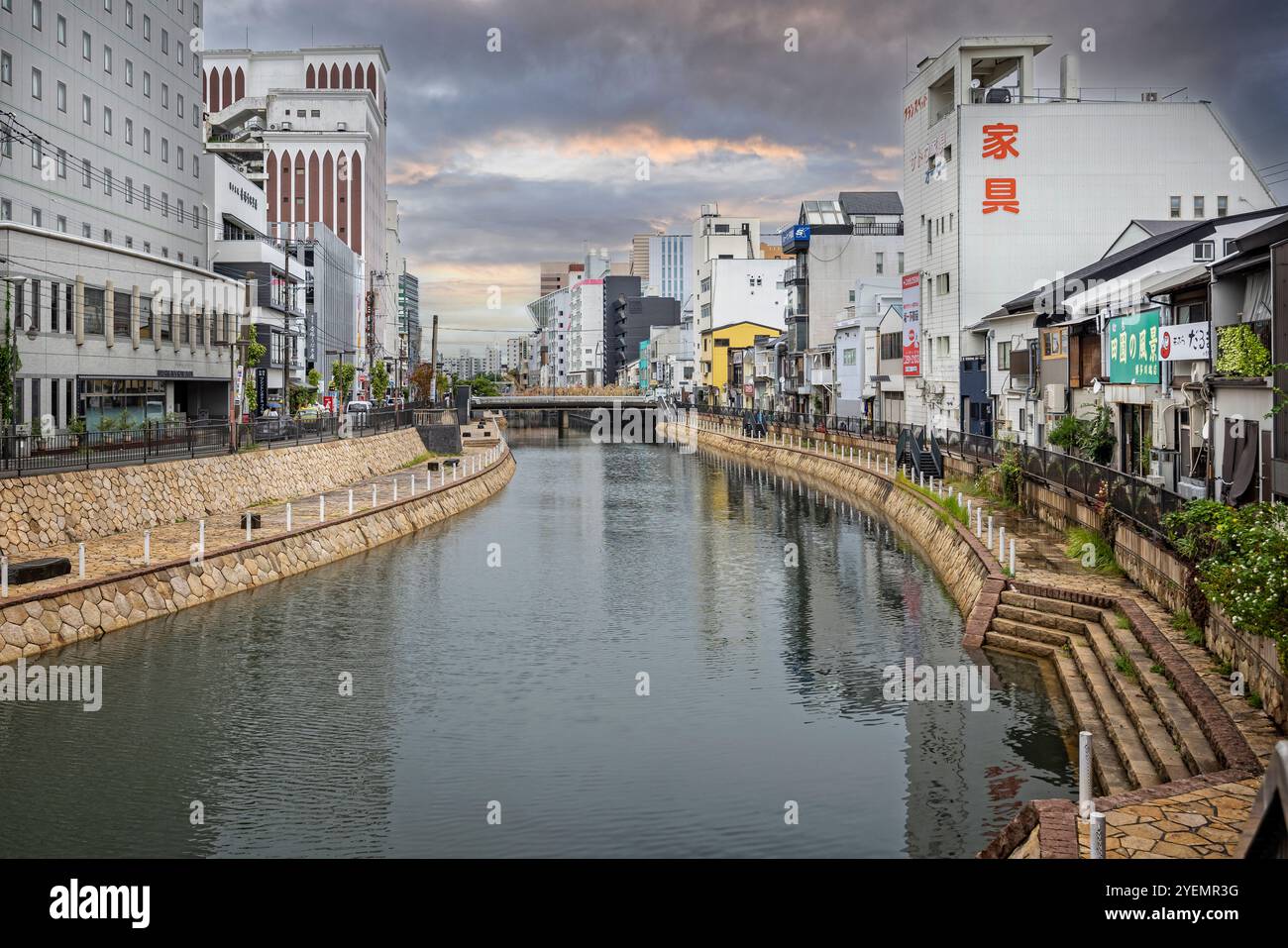 View along the Naka River in downtown Fukuoka at sunset in Fukuoka ...