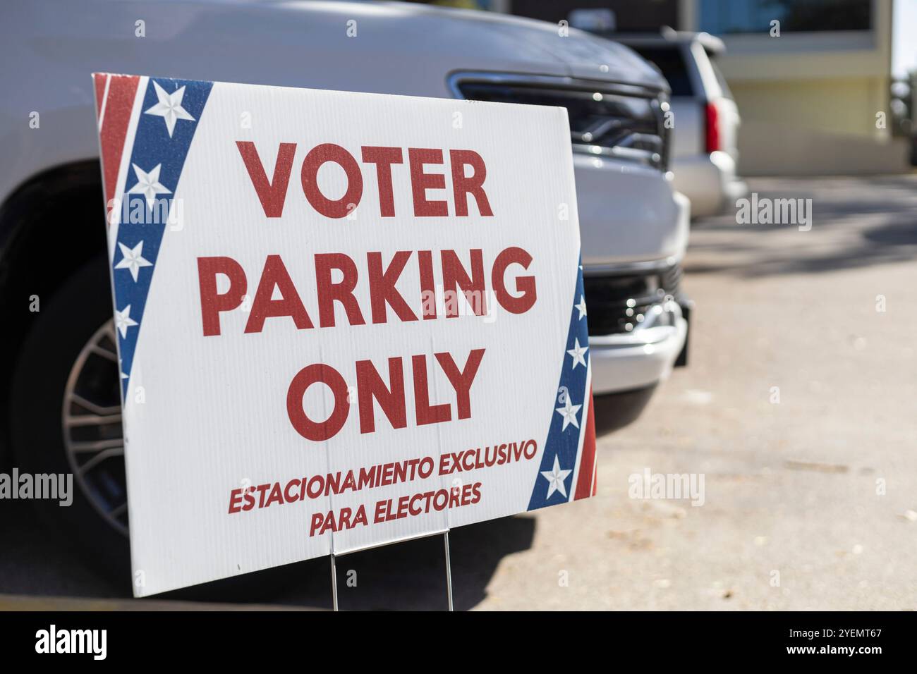 Sign at the entrance to a voter parking only parking lot. Voting ...