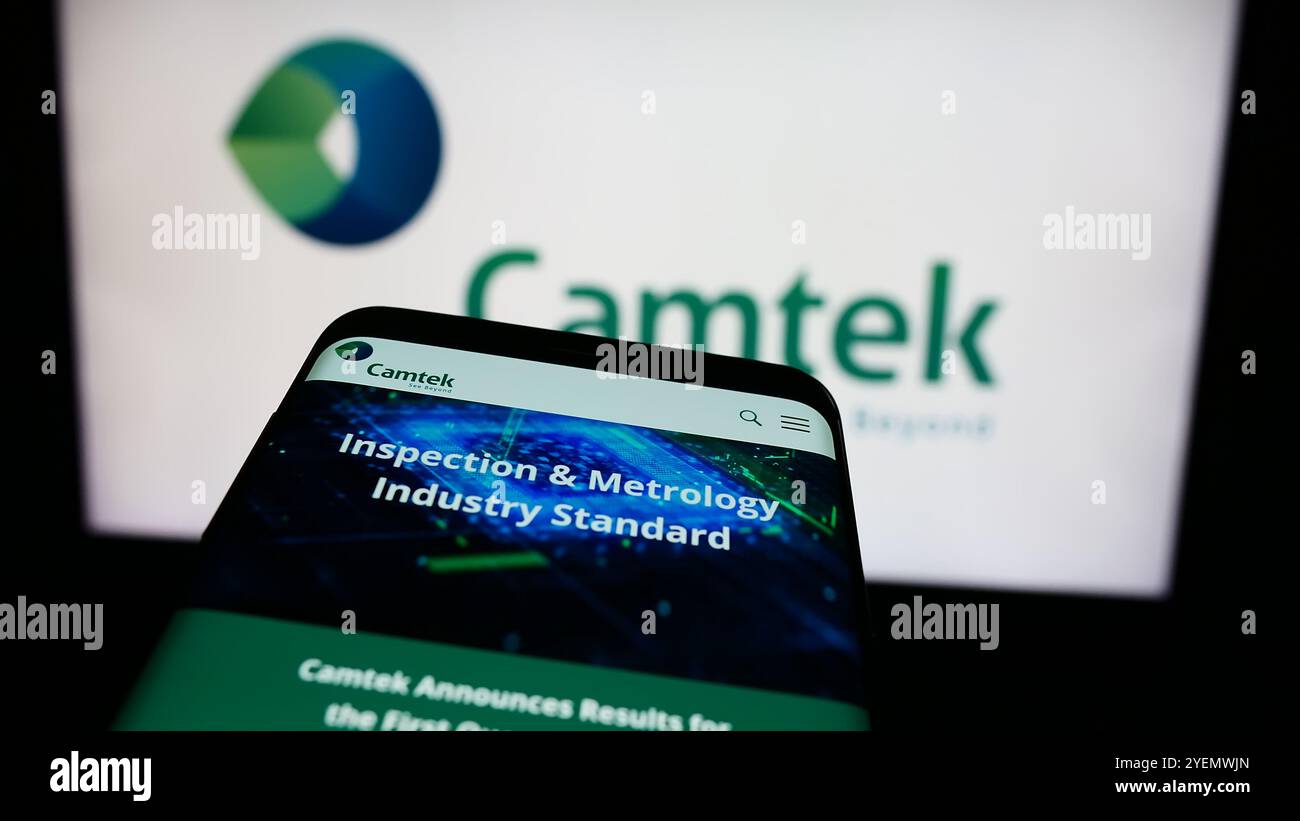 In this photo illustration, a mobile phone with the website of Israeli metrology equipment ...