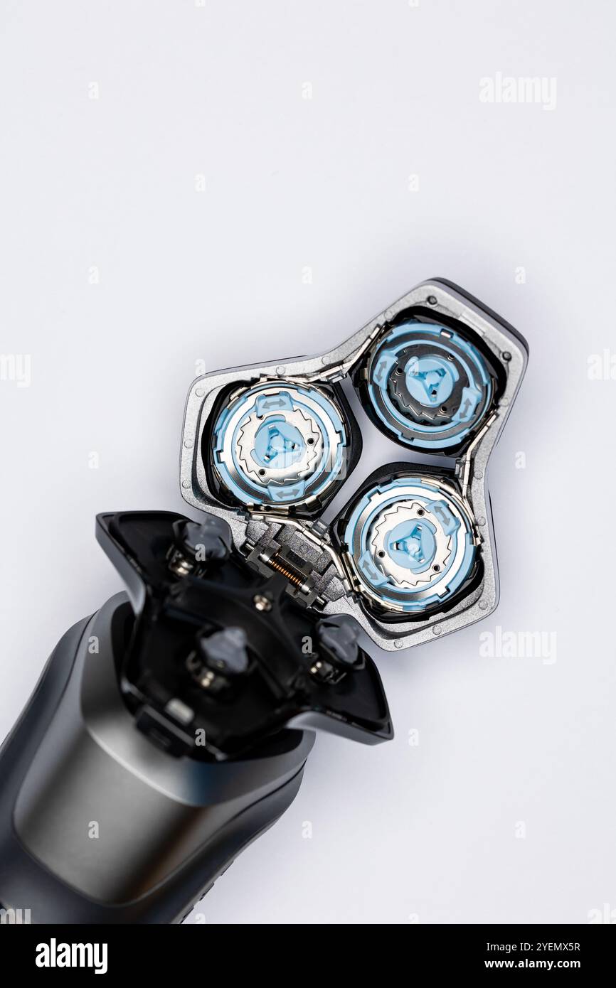 Beard electric shaver on a white background. Inside view of the cutting ...