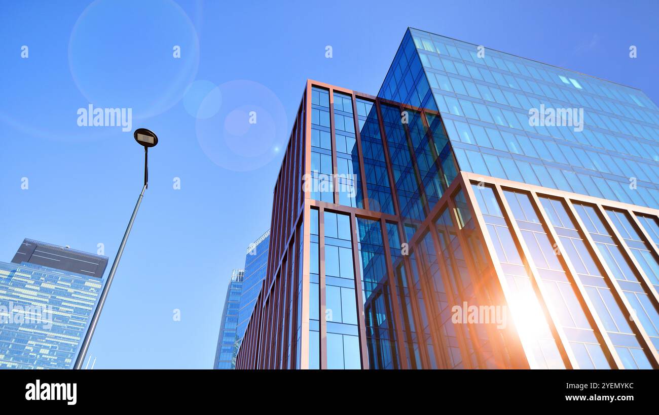 Looking Up modern high-rise office buildings with blue sky in the ...