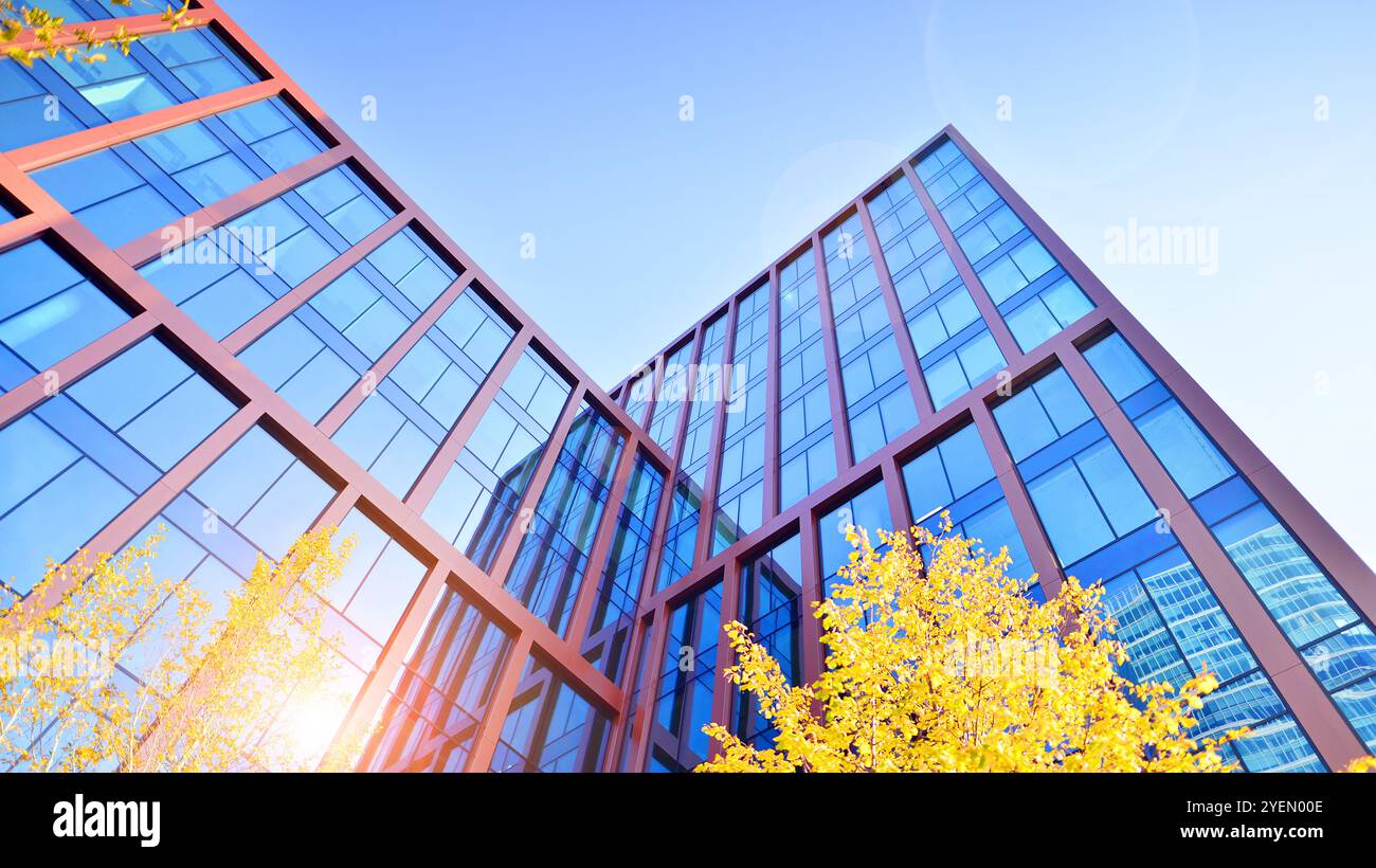 Sustainable glass office building with trees for reducing carbon ...
