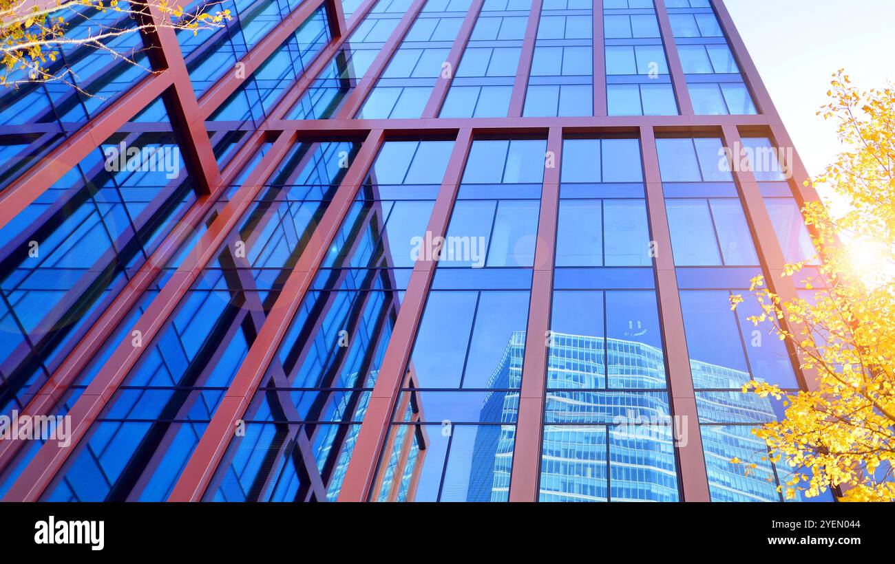 Sustainable glass office building with trees for reducing carbon ...