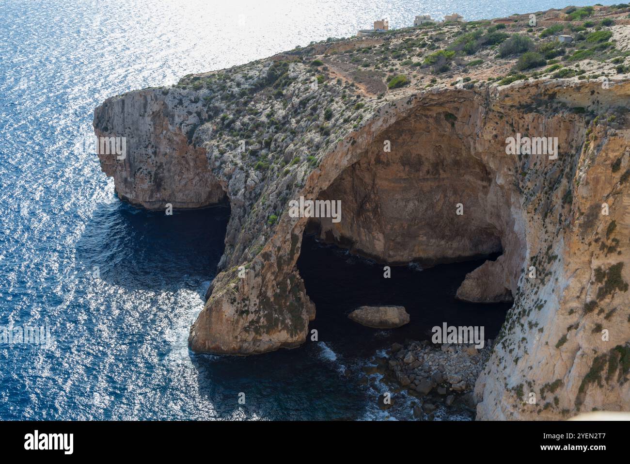 Blue Grotto in Malta, Europe. Touristic boats run under the natural ...