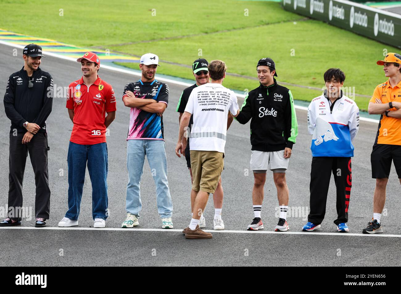 All drivers paying tribute to Ayrton Senna, with Sebastian Vettel ...